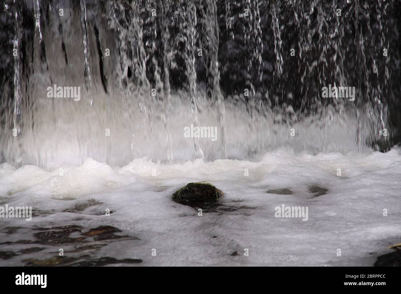 Close-Up View of Waterfall Cascading into Rockpool River Stock Photo ...