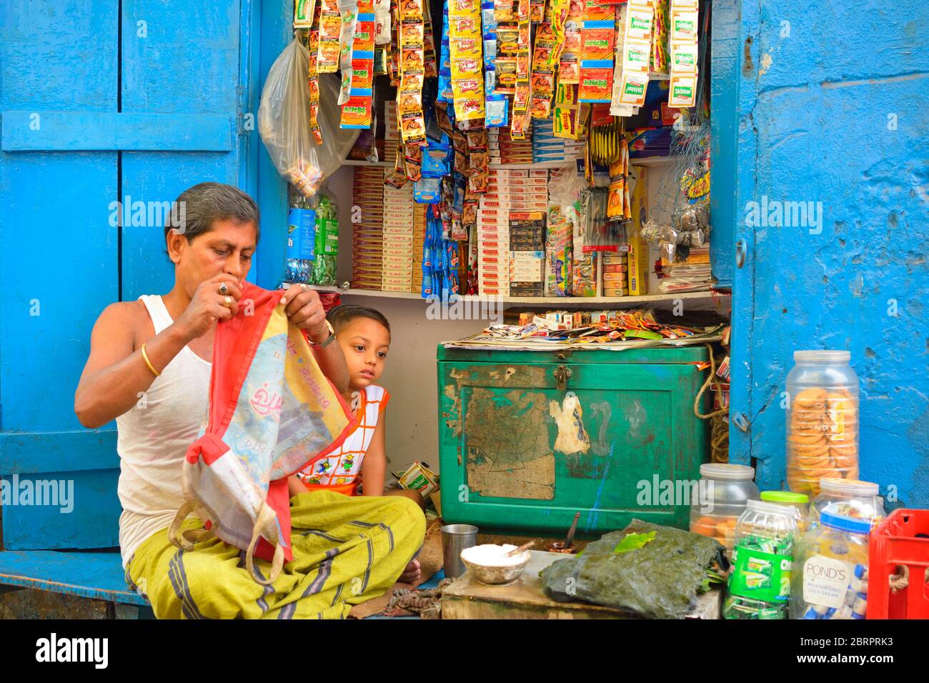 Shopkeeper selling customer hi-res stock photography and images - Alamy