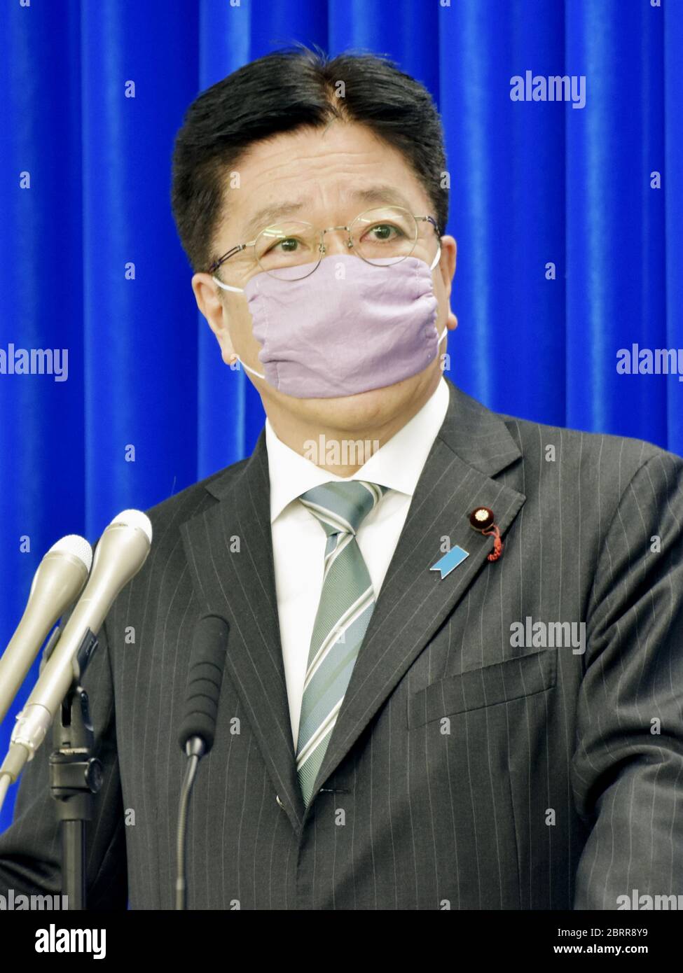 Japanese health minister Katsunobu Kato tells a press conference in ...