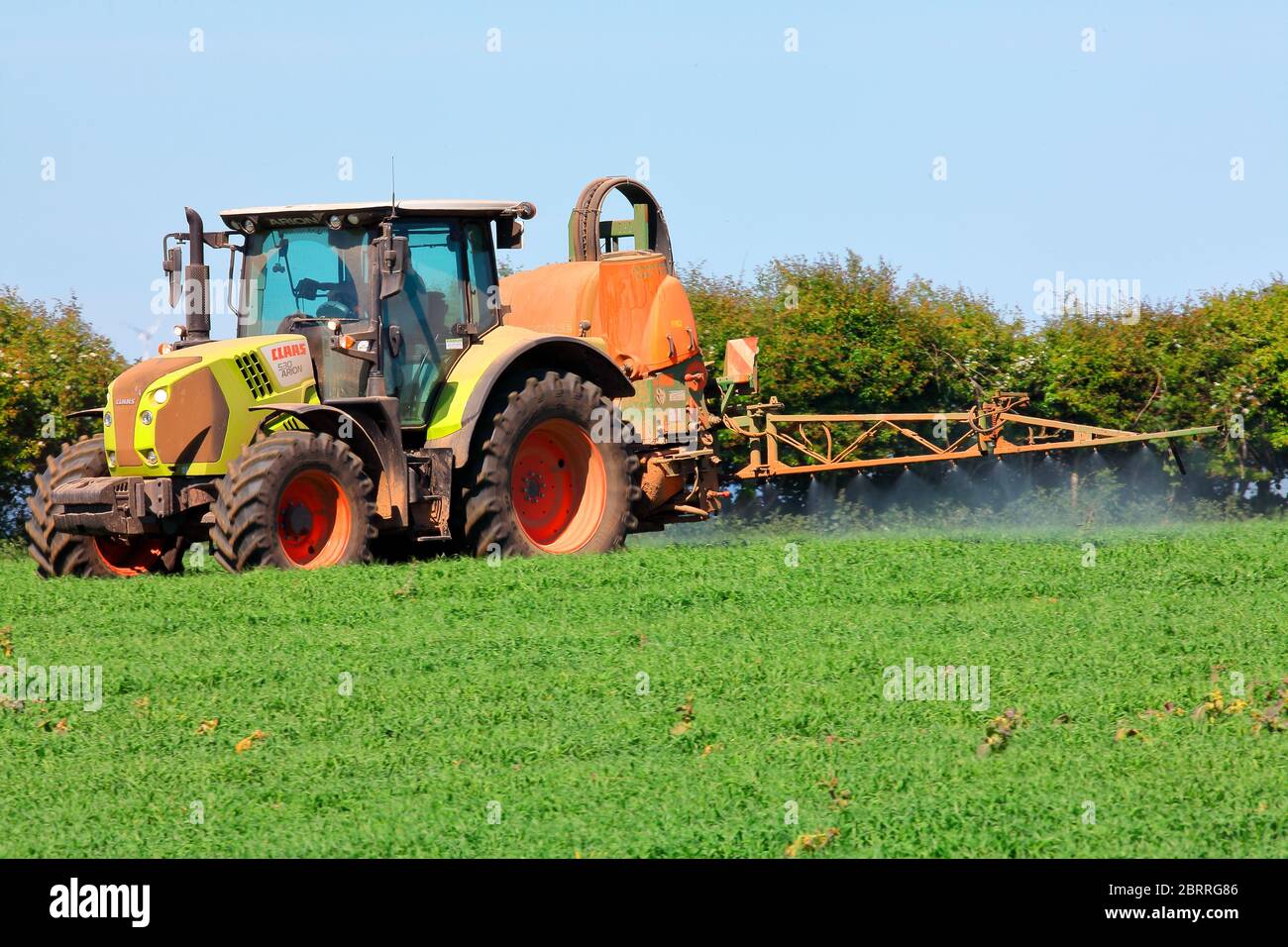 Crop spraying the whole field with this tractor mounted spray unit ...