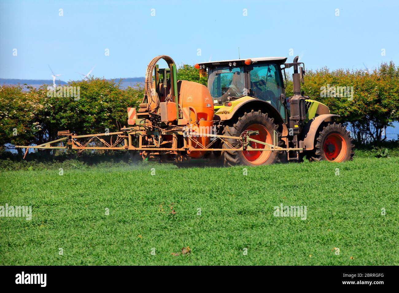 Crop spraying the whole field with this tractor mounted spray unit ...