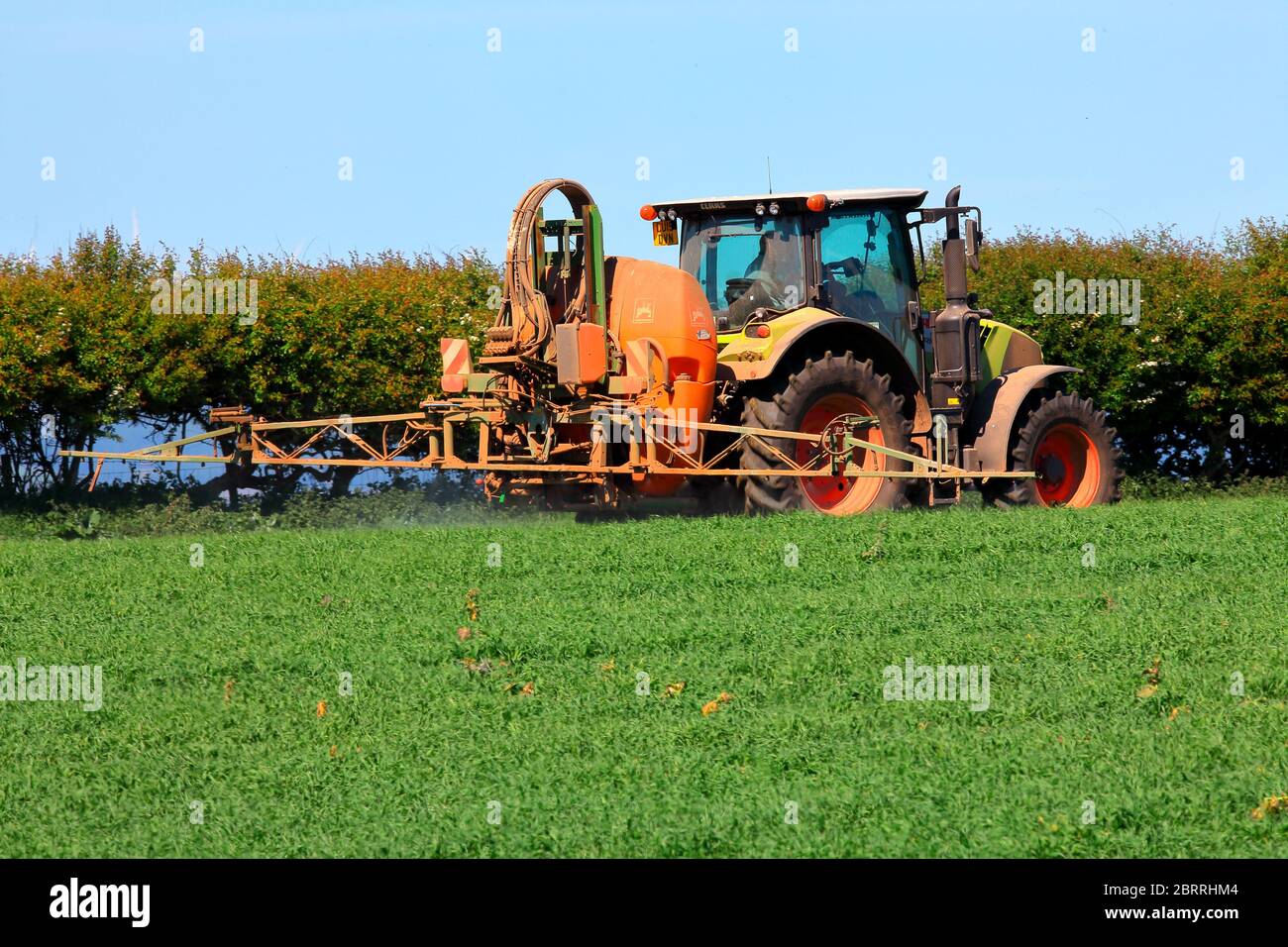 Crop spraying the whole field with this tractor mounted spray unit ...