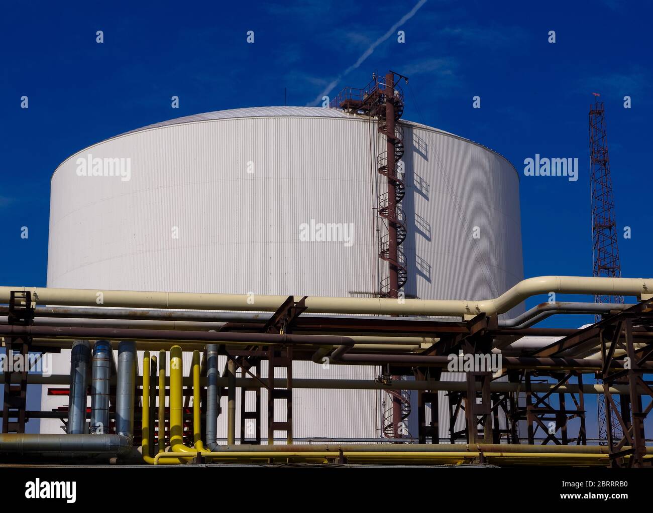 Crude oil tank in the oil refinery. Storage tanks for oil. Tanks for ...