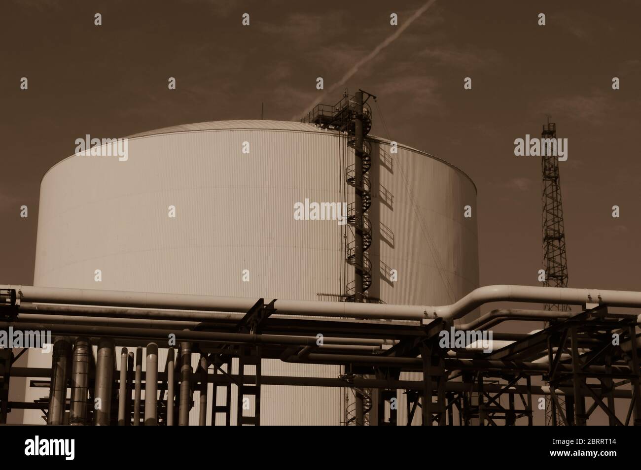 Crude oil tank in the oil refinery. Storage tanks for oil. Tanks for ...