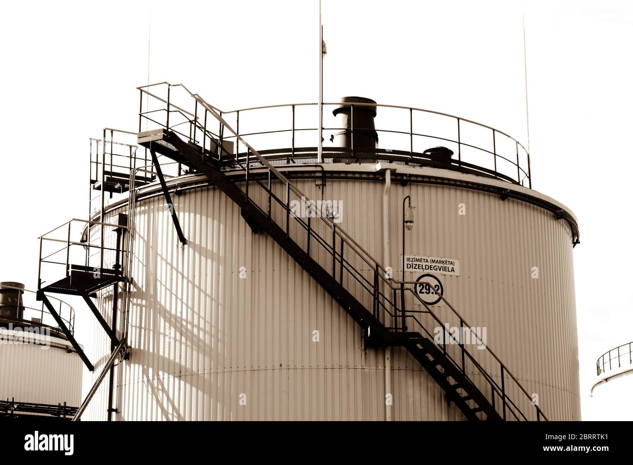 Crude oil tank in the oil refinery. Storage tanks for oil. Tanks for ...
