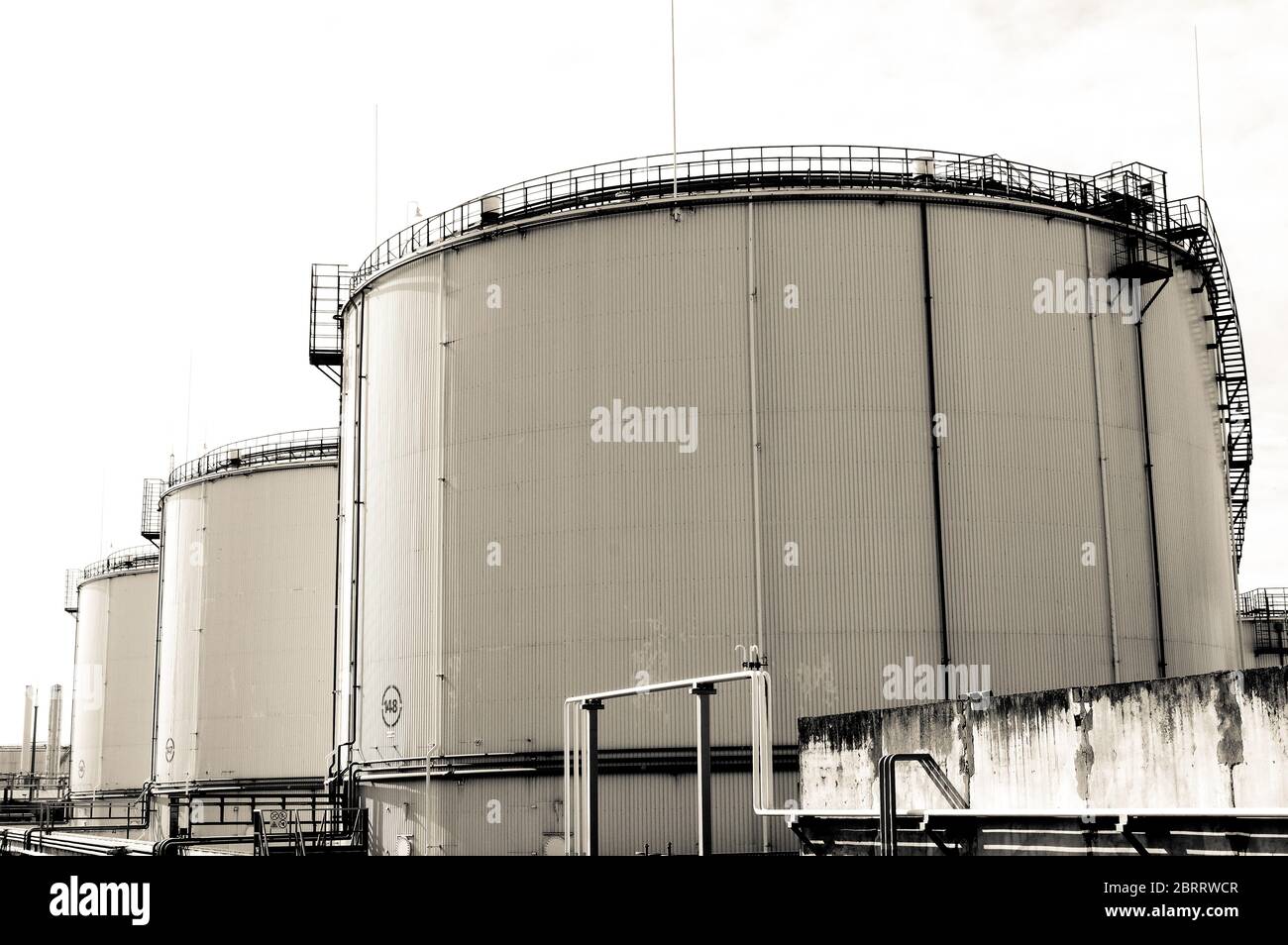Crude oil tank in the oil refinery. Storage tanks for oil. Tanks for ...