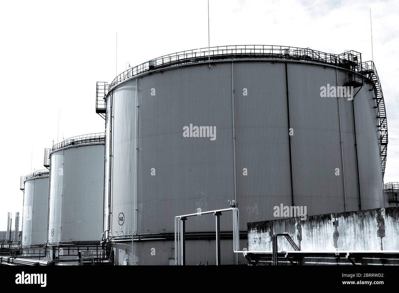 Crude oil tank in the oil refinery. Storage tanks for oil. Tanks for ...