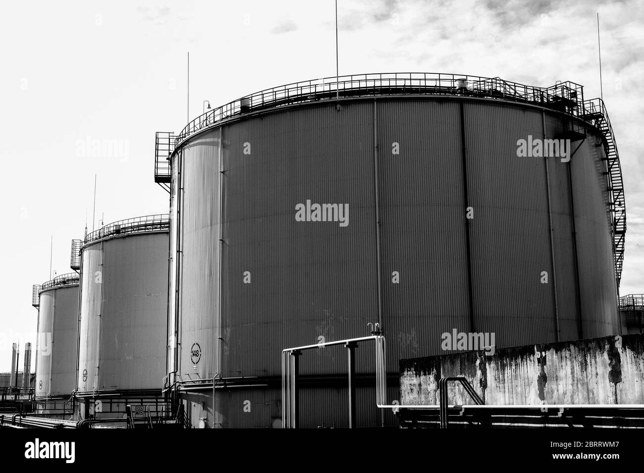 Crude oil tank in the oil refinery. Storage tanks for oil. Tanks for ...