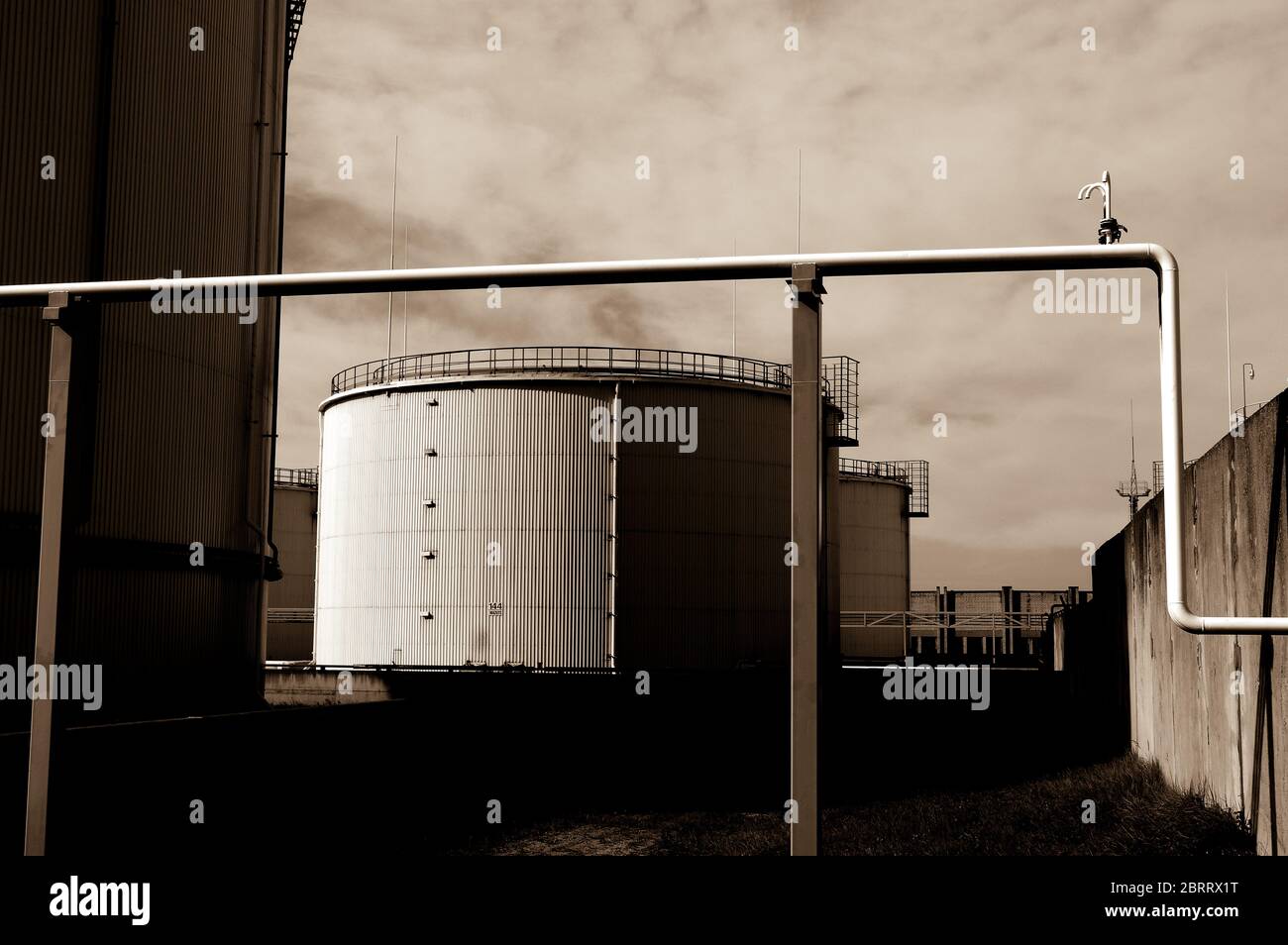 Crude oil tank in the oil refinery. Storage tanks for oil. Tanks for ...