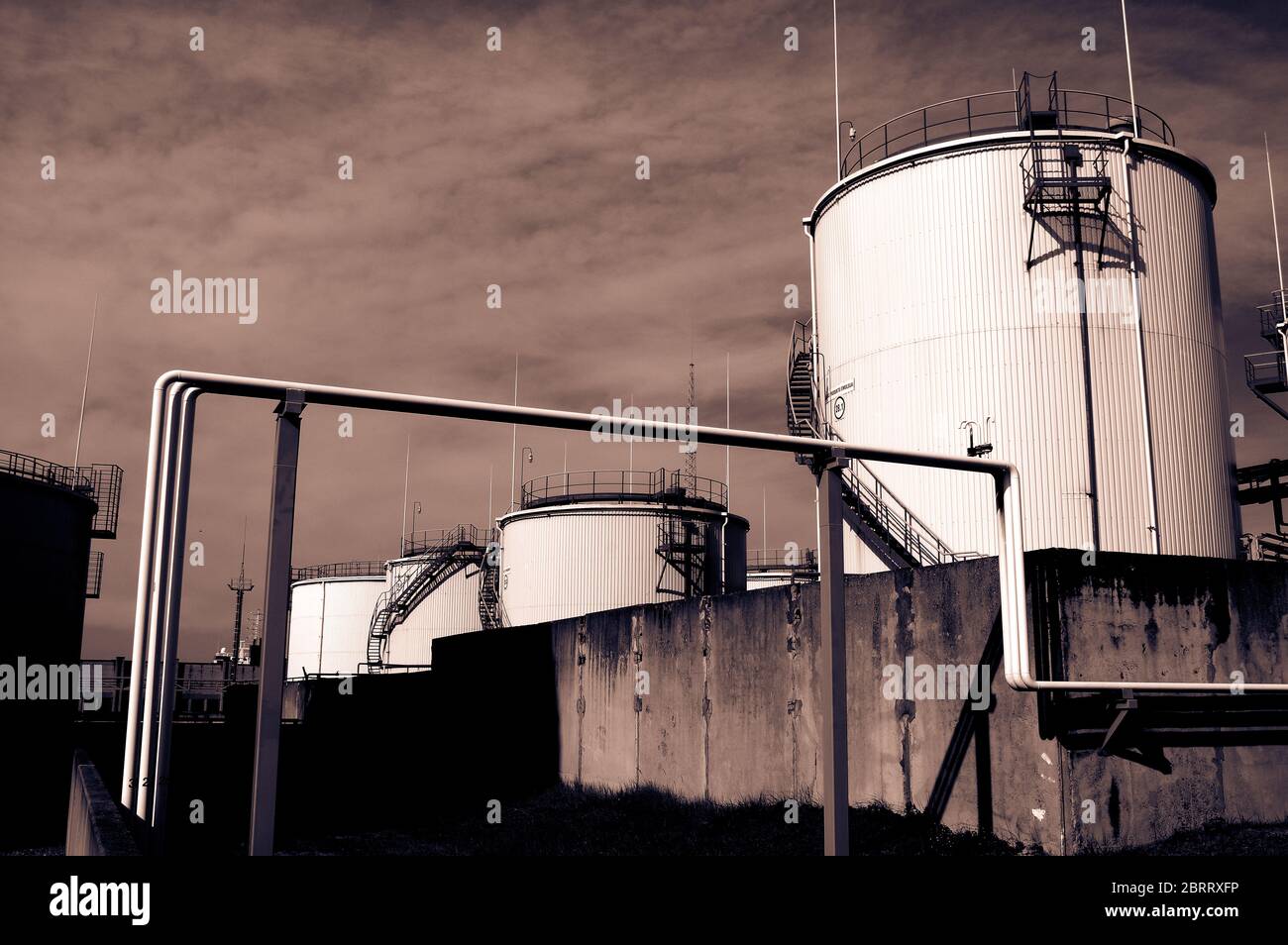 Crude oil tank in the oil refinery. Storage tanks for oil. Tanks for ...