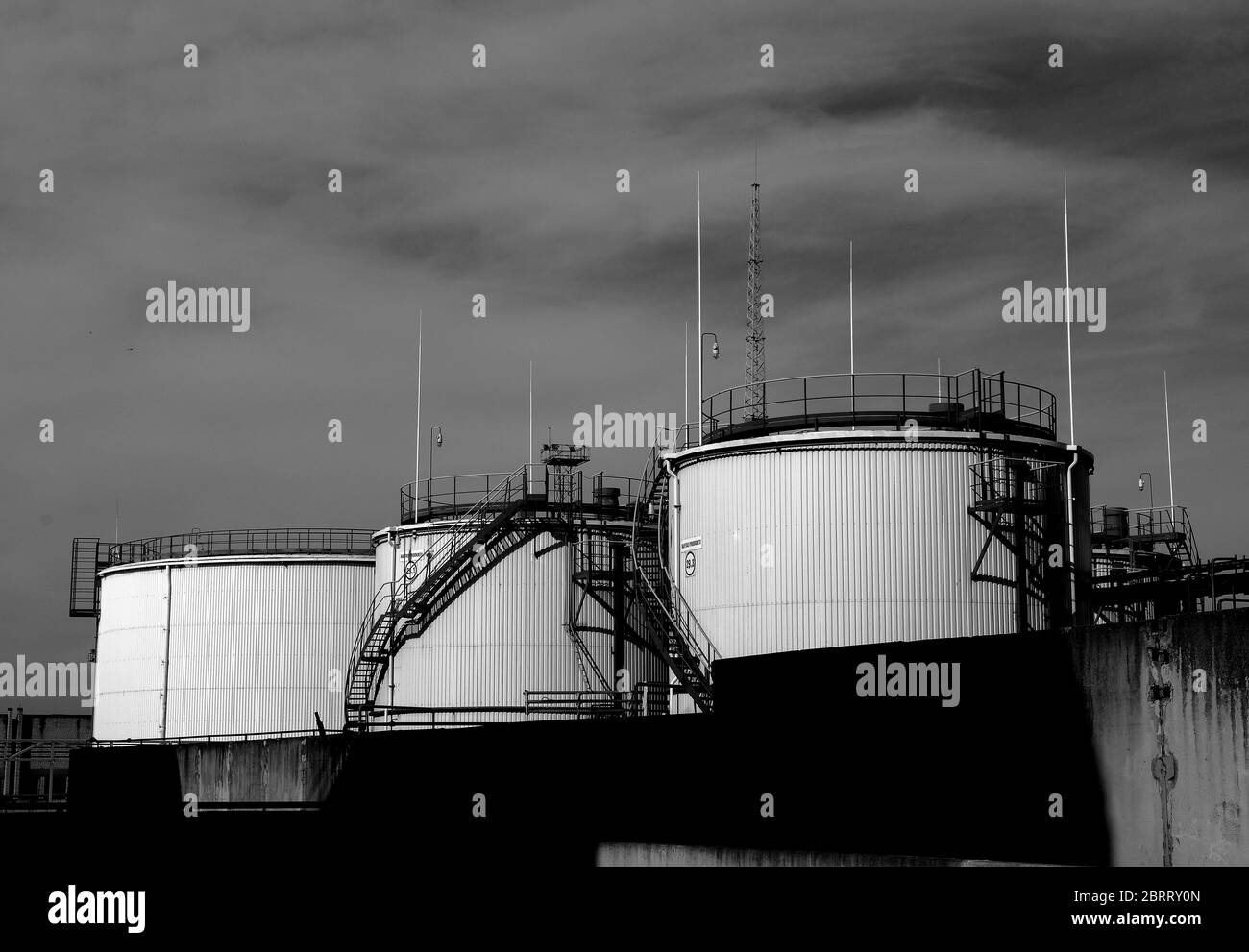 Crude oil tank in the oil refinery. Storage tanks for oil. Tanks for ...