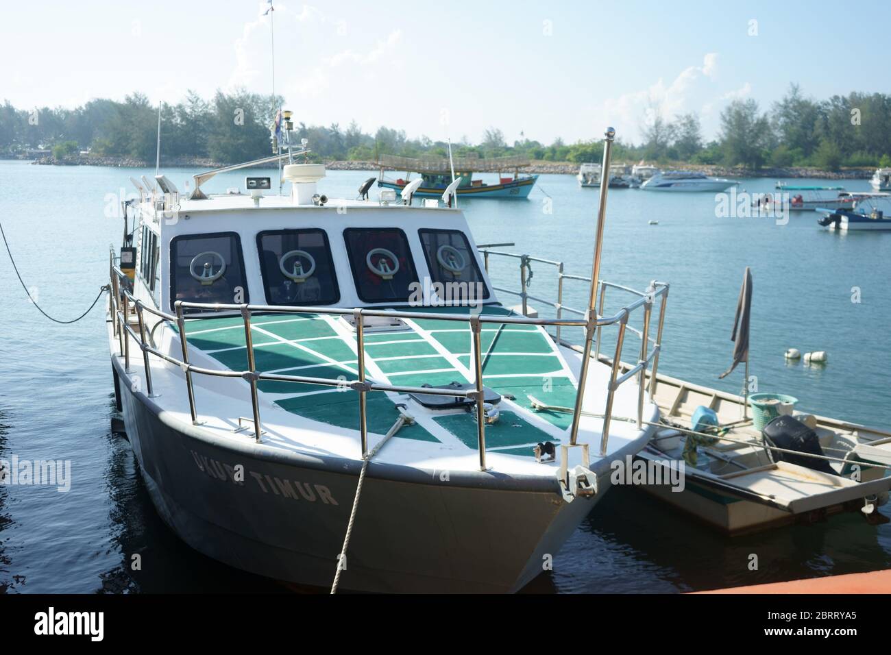Speed boat parking at jetty Stock Photo - Alamy