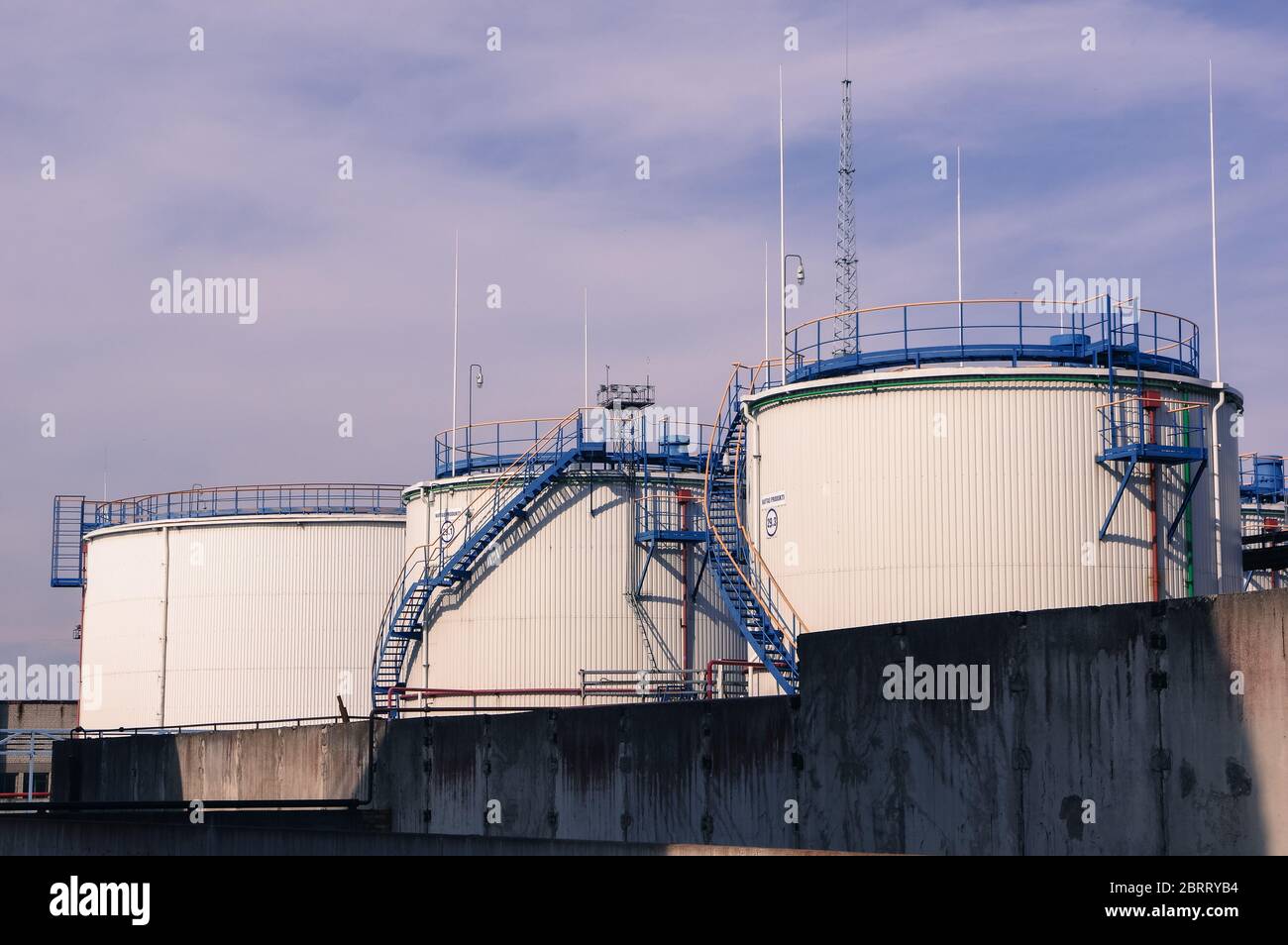 Crude oil tank in the oil refinery. Storage tanks for oil. Tanks for ...