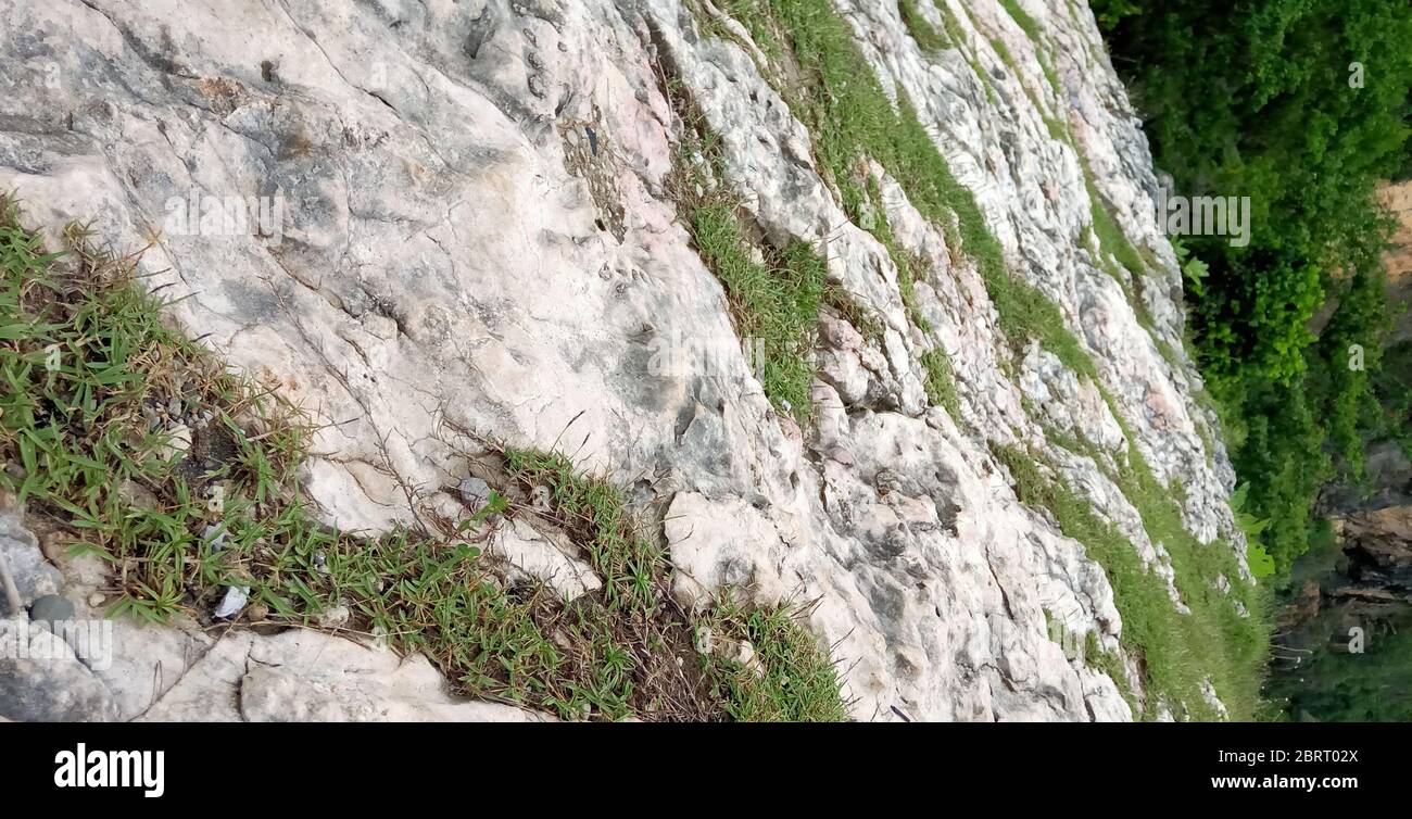 very steep cliffs in the mountains Stock Photo - Alamy