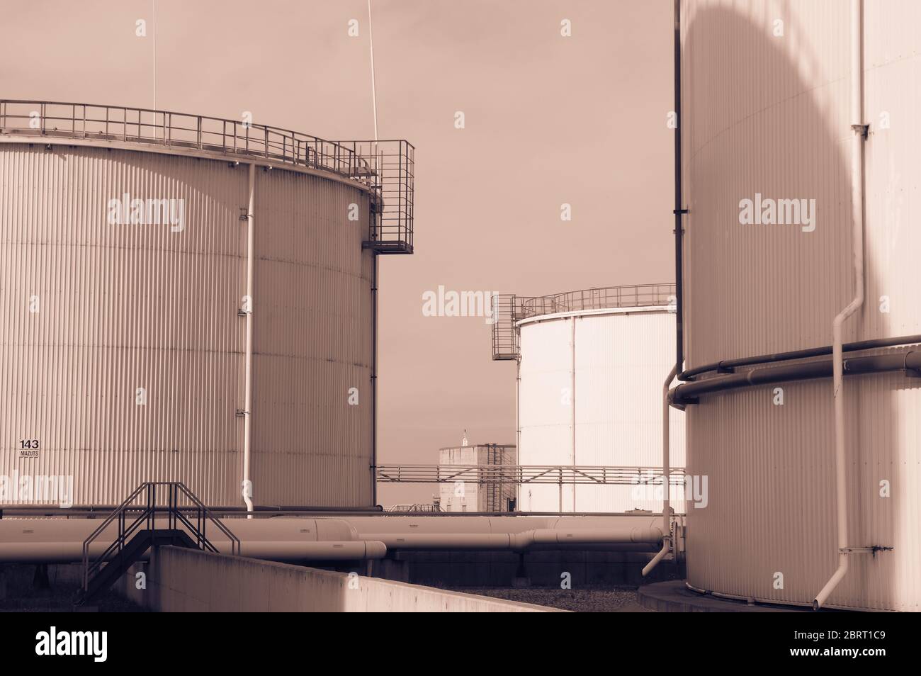 Crude oil tank in the oil refinery. Storage tanks for oil. Tanks for ...