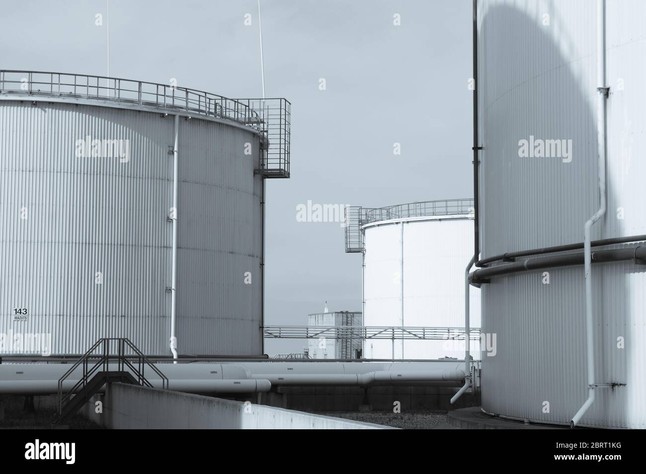 Crude oil tank in the oil refinery. Storage tanks for oil. Tanks for ...