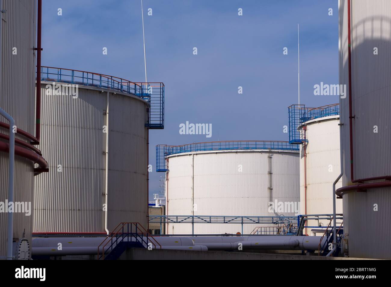 Crude oil tank in the oil refinery. Storage tanks for oil. Tanks for ...
