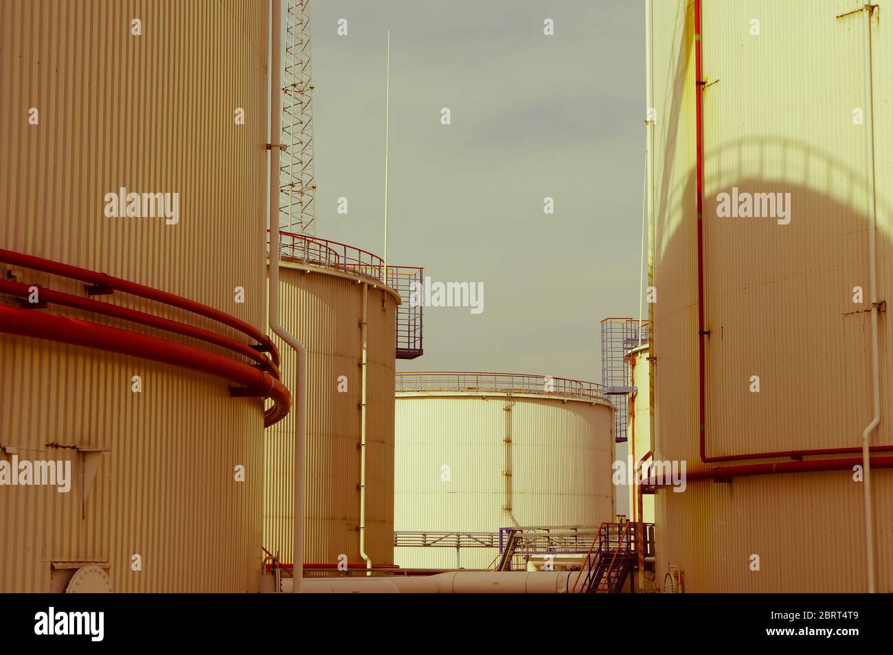 Crude oil tank in the oil refinery. Storage tanks for oil. Tanks for ...