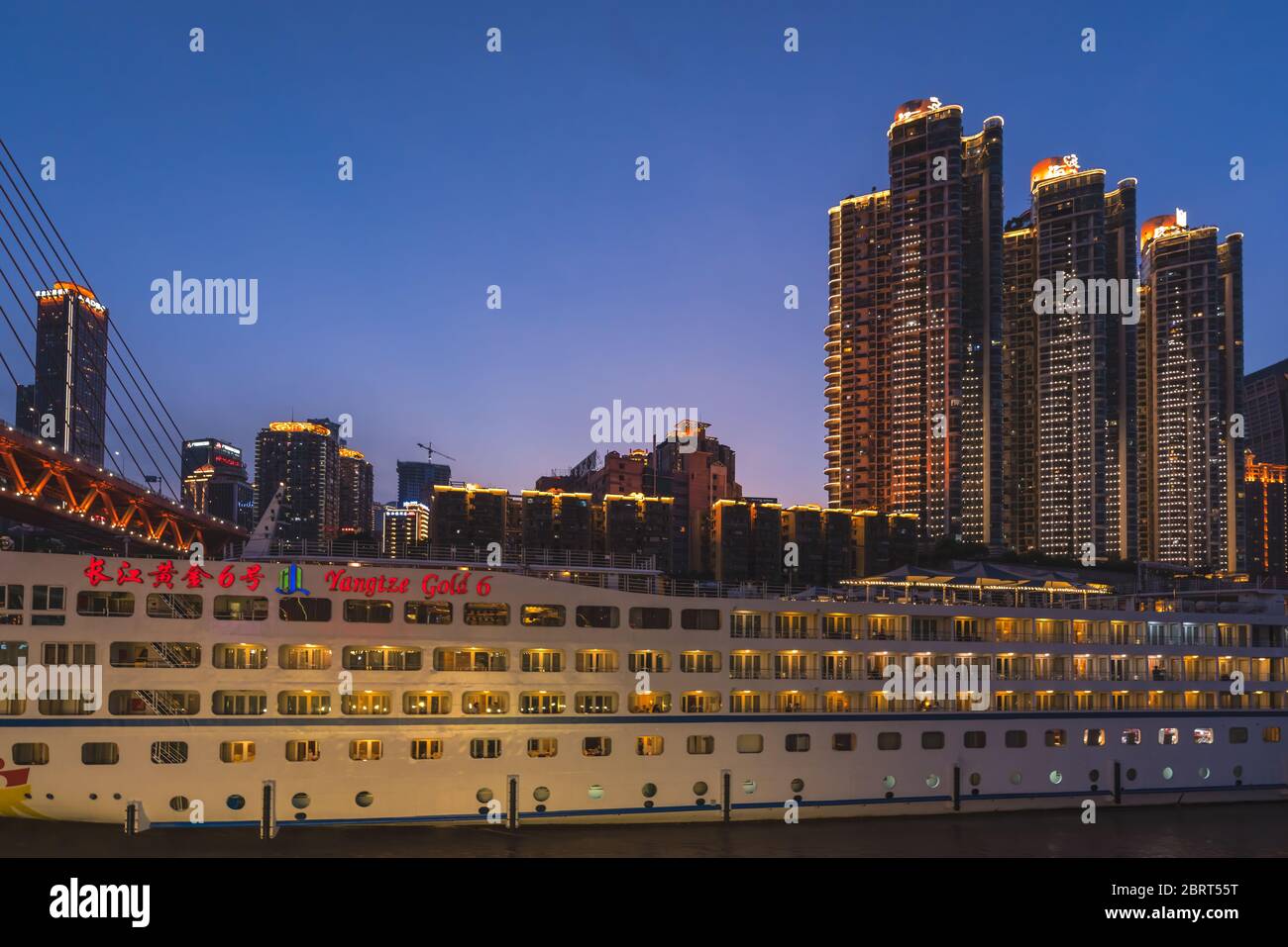Chongqing, China - August 2019 : Brightly lit huge passenger ship ...