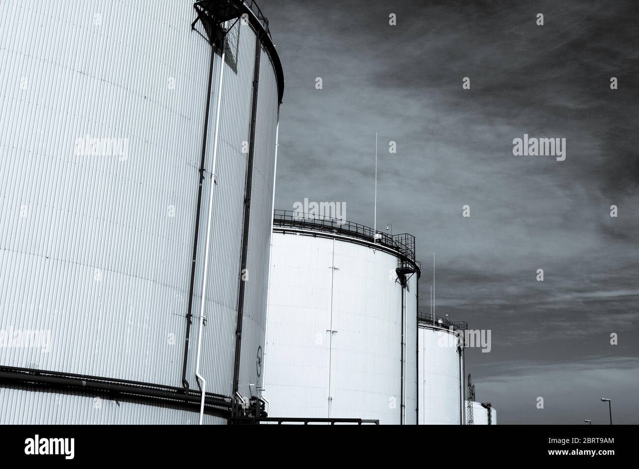 Crude oil tank in the oil refinery. Storage tanks for oil. Tanks for ...