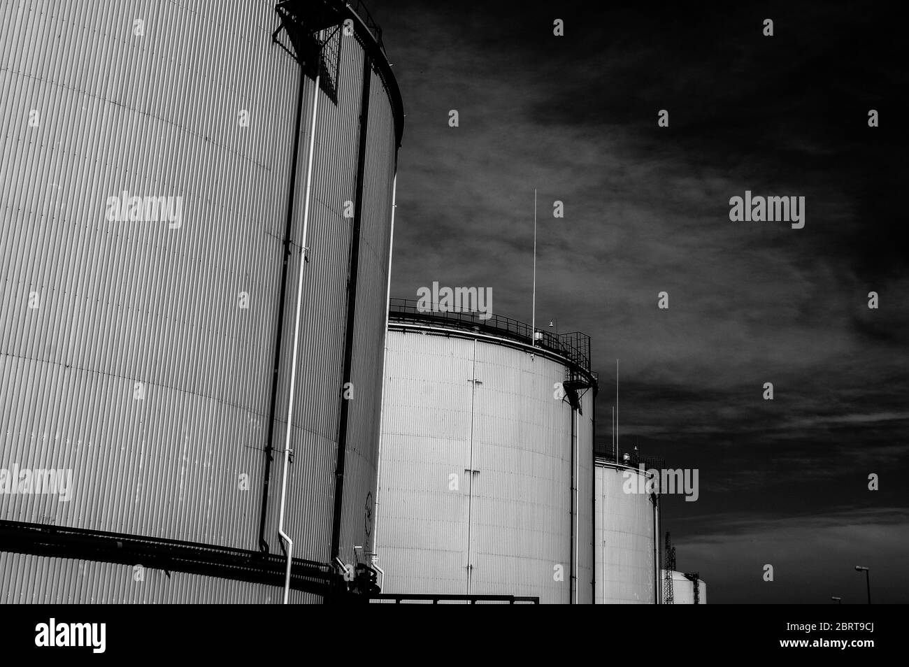 Crude oil tank in the oil refinery. Storage tanks for oil. Tanks for ...