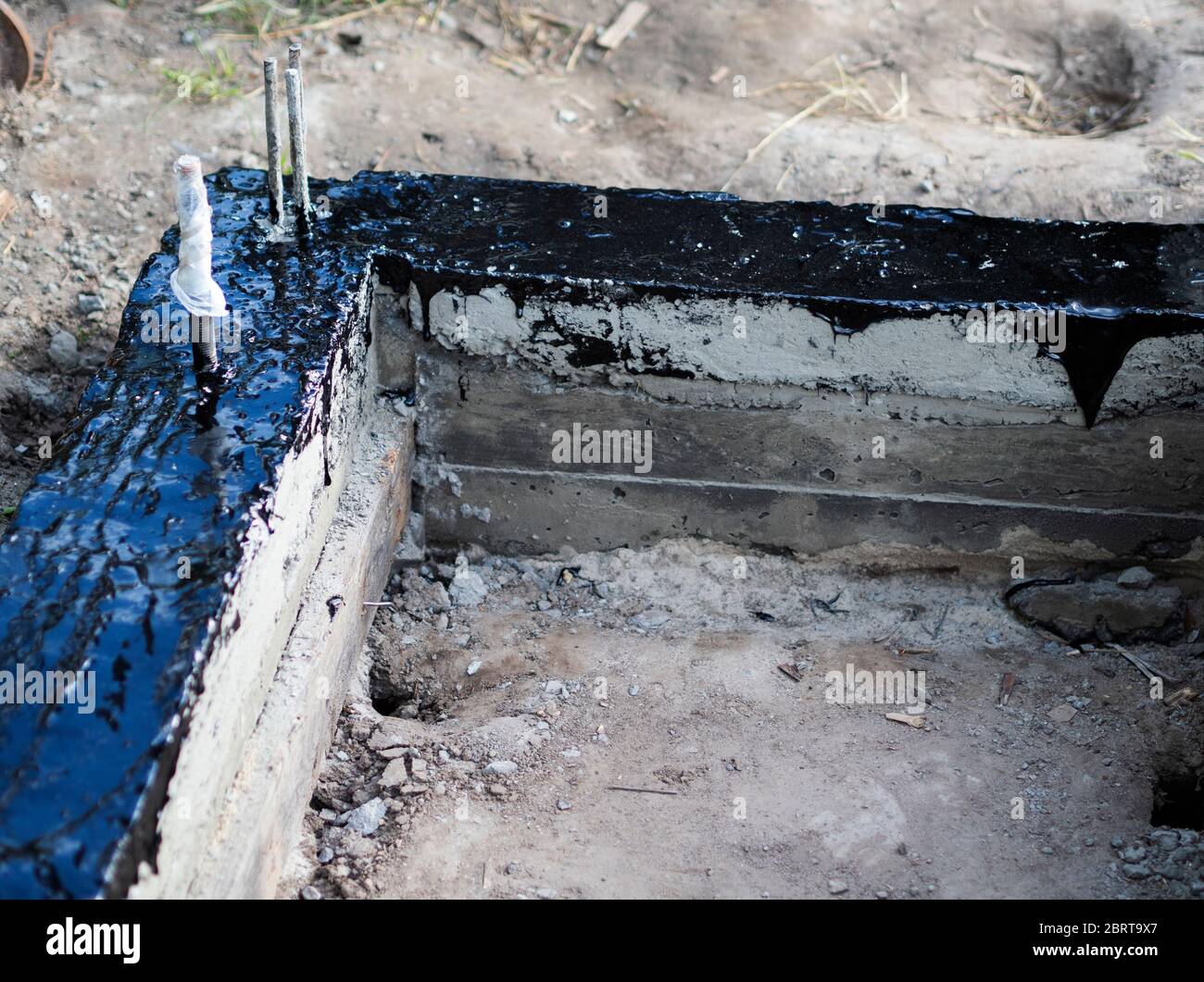 Strip foundation coated with bituminous mastic for waterproofing Stock ...