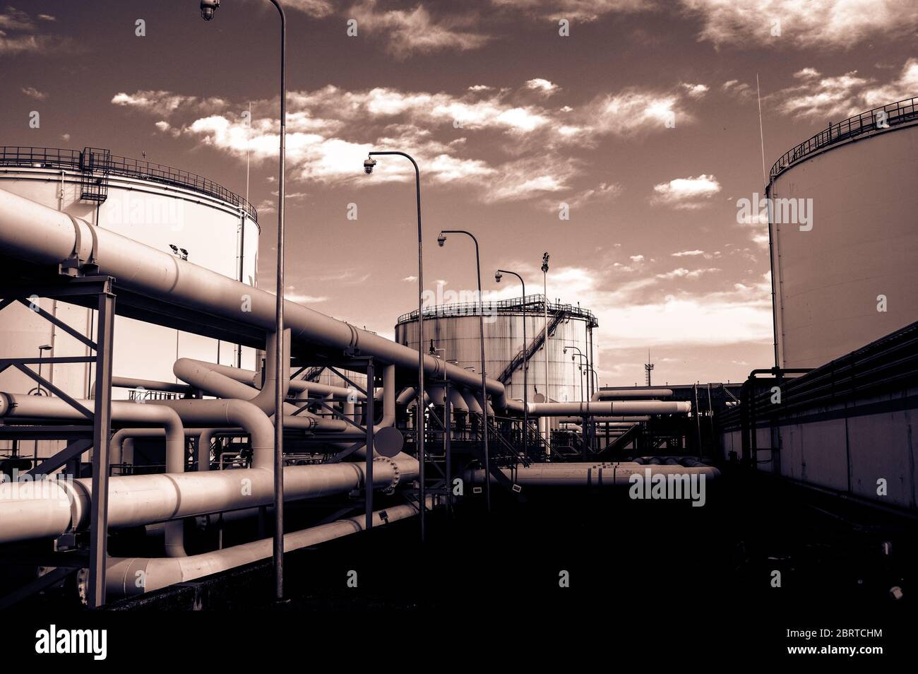 Crude oil tank in the oil refinery. Storage tanks for oil. Tanks for ...