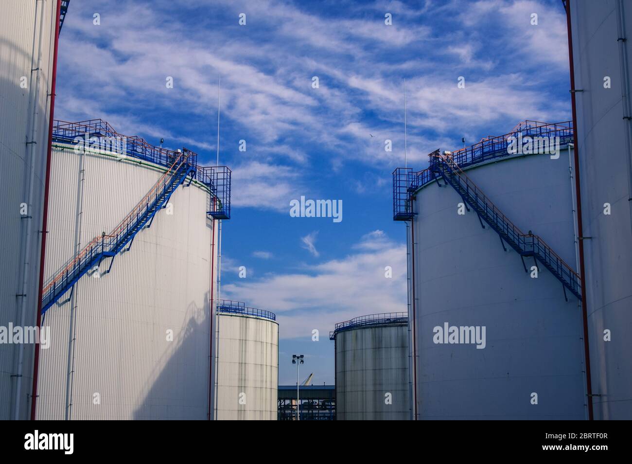 Crude oil tank in the oil refinery. Storage tanks for oil. Tanks for ...