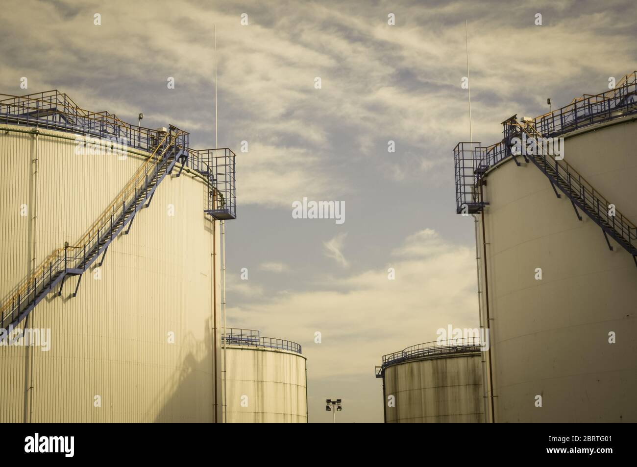 Crude oil tank in the oil refinery. Storage tanks for oil. Tanks for ...