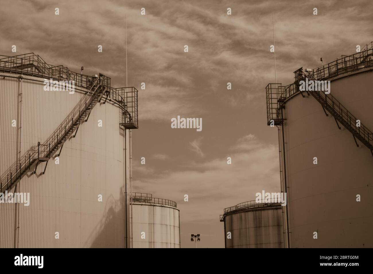 Crude oil tank in the oil refinery. Storage tanks for oil. Tanks for ...