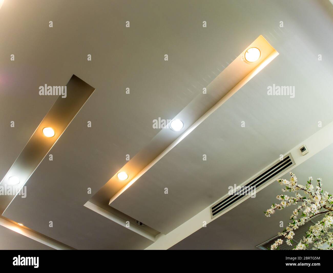 Lighting on the modern office ceiling Stock Photo - Alamy