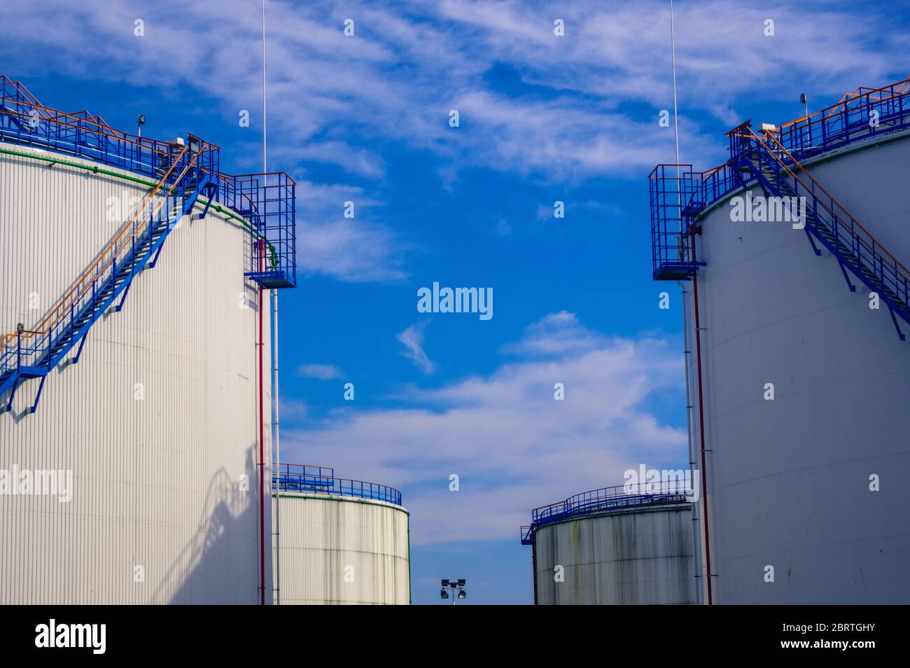 Crude oil tank in the oil refinery. Storage tanks for oil. Tanks for ...