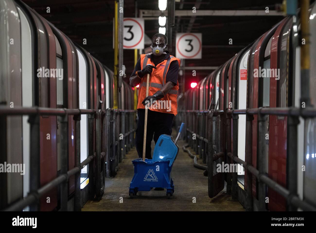 A TfL worker deep cleans a Victoria Line tube train at the London ...