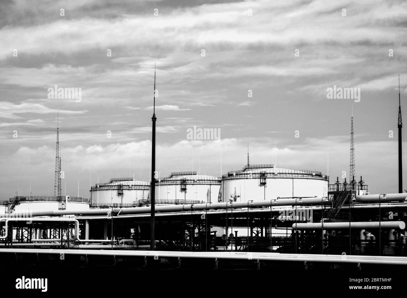 Crude oil tank in the oil refinery. Storage tanks for oil. Tanks for ...