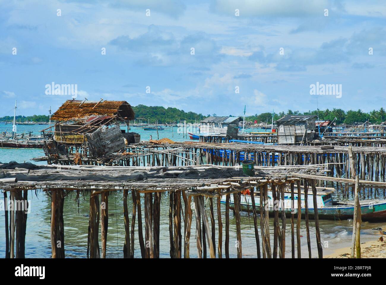 Broken hut on wooden pier Stock Photo - Alamy