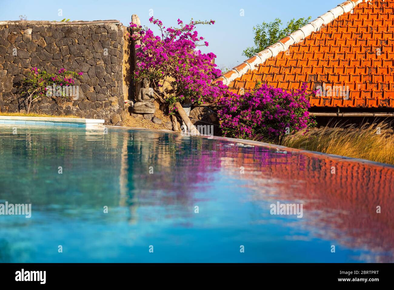 View of swimming pool at Bali hotel. Indonesia Stock Photo - Alamy