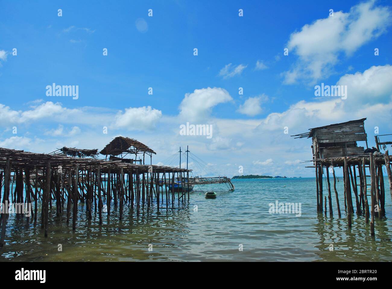 Broken hut on wooden pier Stock Photo - Alamy