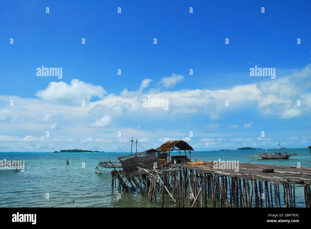 Broken hut on wooden pier Stock Photo - Alamy