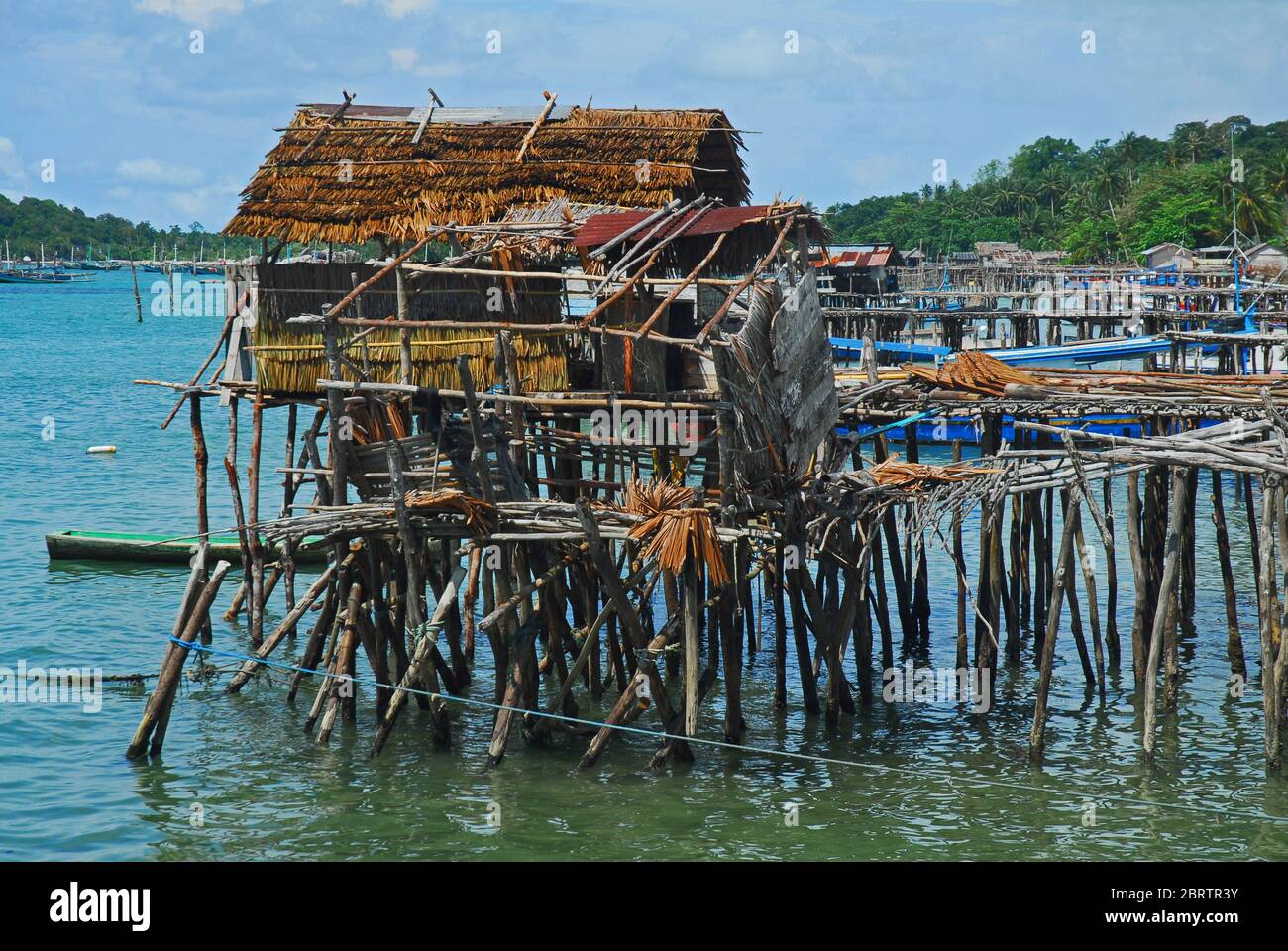 Broken hut on wooden pier Stock Photo - Alamy