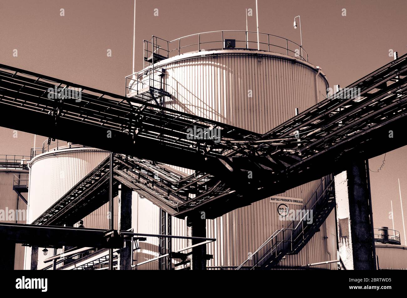 Crude oil tank in the oil refinery. Storage tanks for oil. Tanks for ...