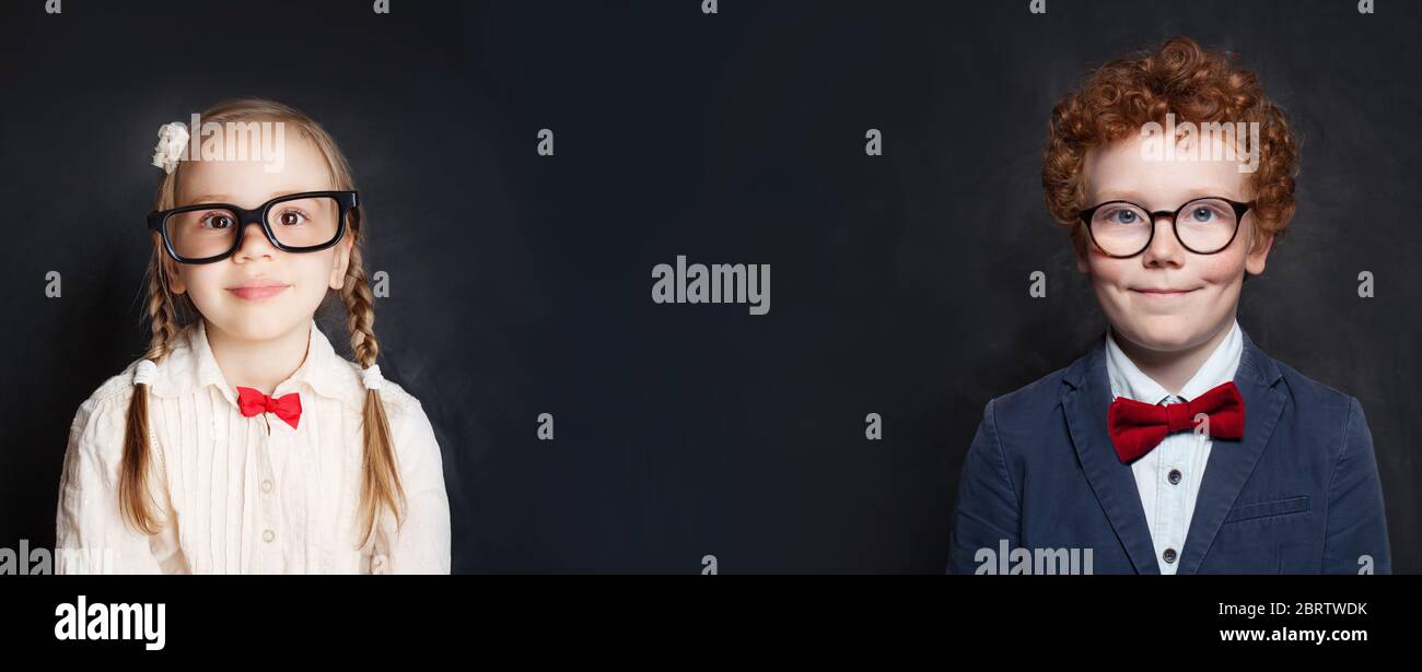 Happy kids on blackboard background, back to school concept Stock Photo ...