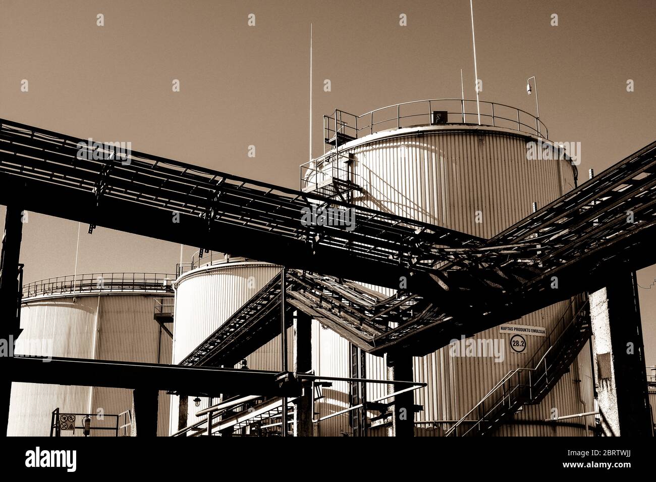 Crude oil tank in the oil refinery. Storage tanks for oil. Tanks for ...