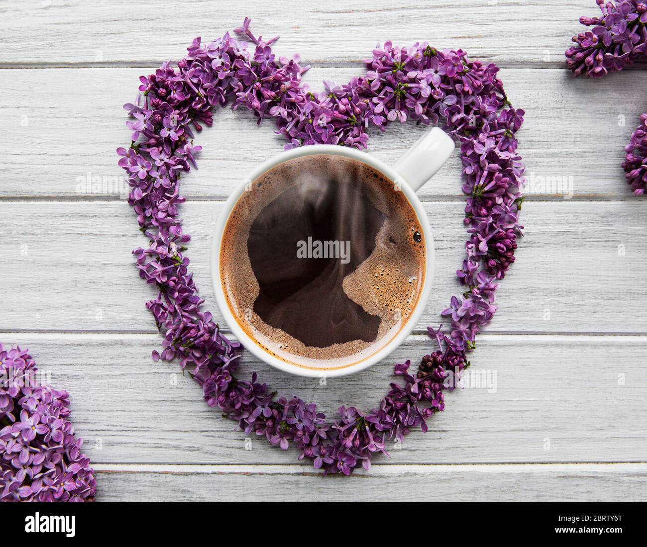 Bouquet lilacs cup coffee hi-res stock photography and images - Alamy