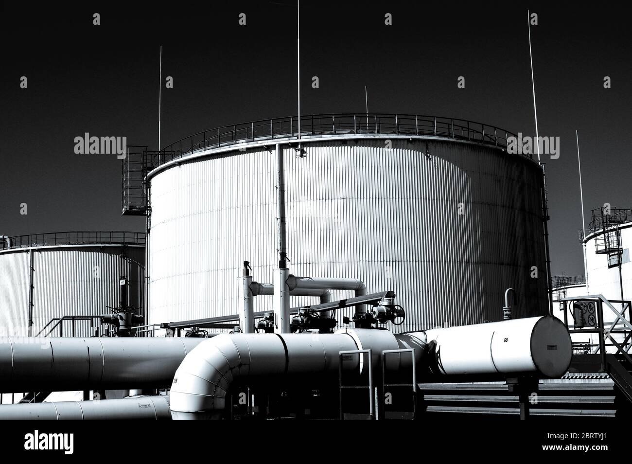 Crude oil tank in the oil refinery. Storage tanks for oil. Tanks for ...
