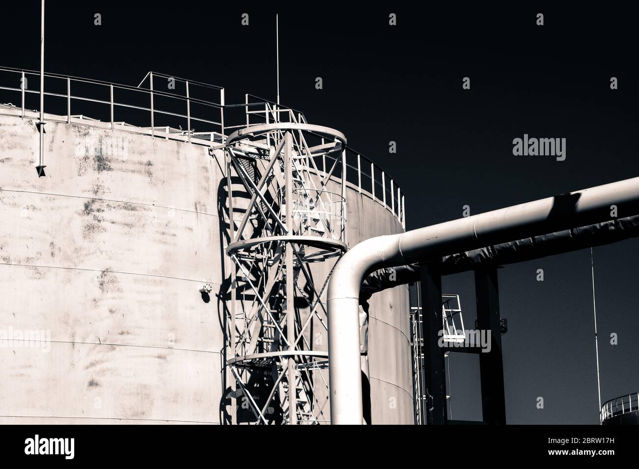 Crude oil tank in the oil refinery. Storage tanks for oil. Tanks for ...