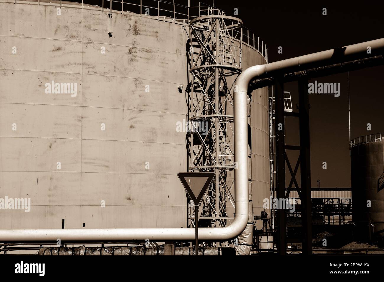 Crude oil tank in the oil refinery. Storage tanks for oil. Tanks for ...