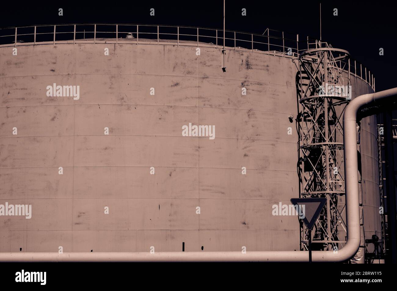 Crude oil tank in the oil refinery. Storage tanks for oil. Tanks for ...