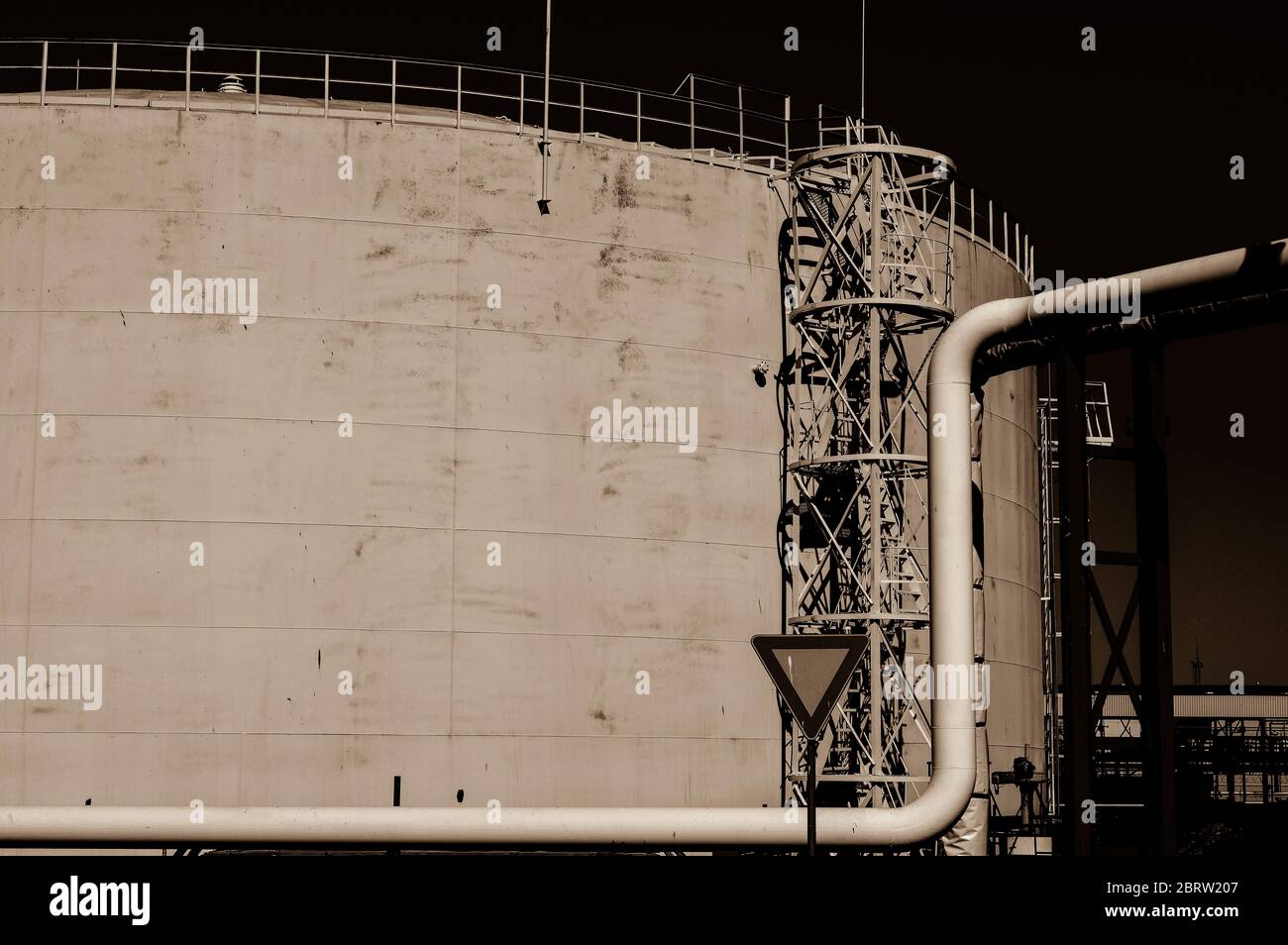 Crude oil tank in the oil refinery. Storage tanks for oil. Tanks for ...