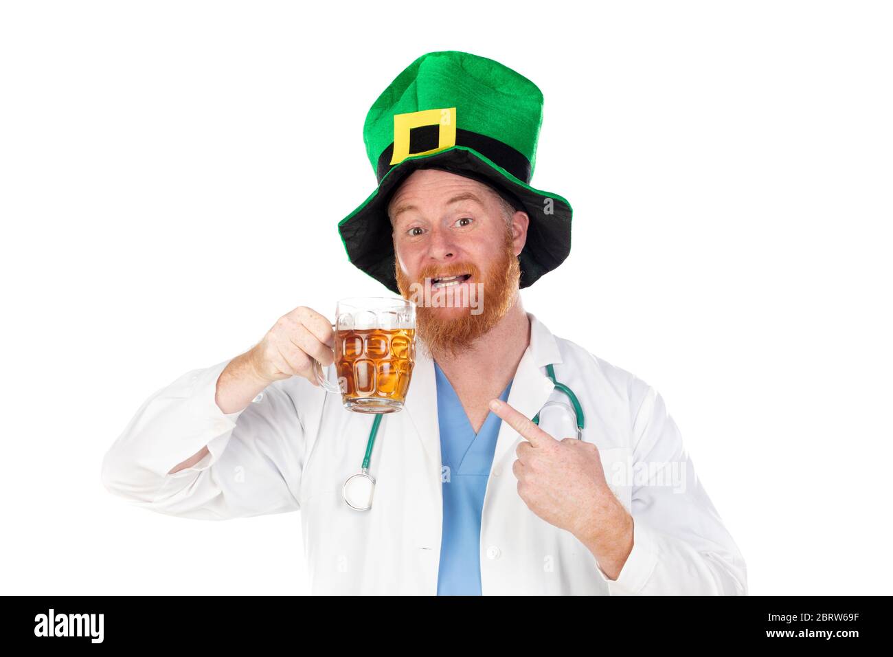 Redhead doctor with green hat drinking a beer isolated on a white ...