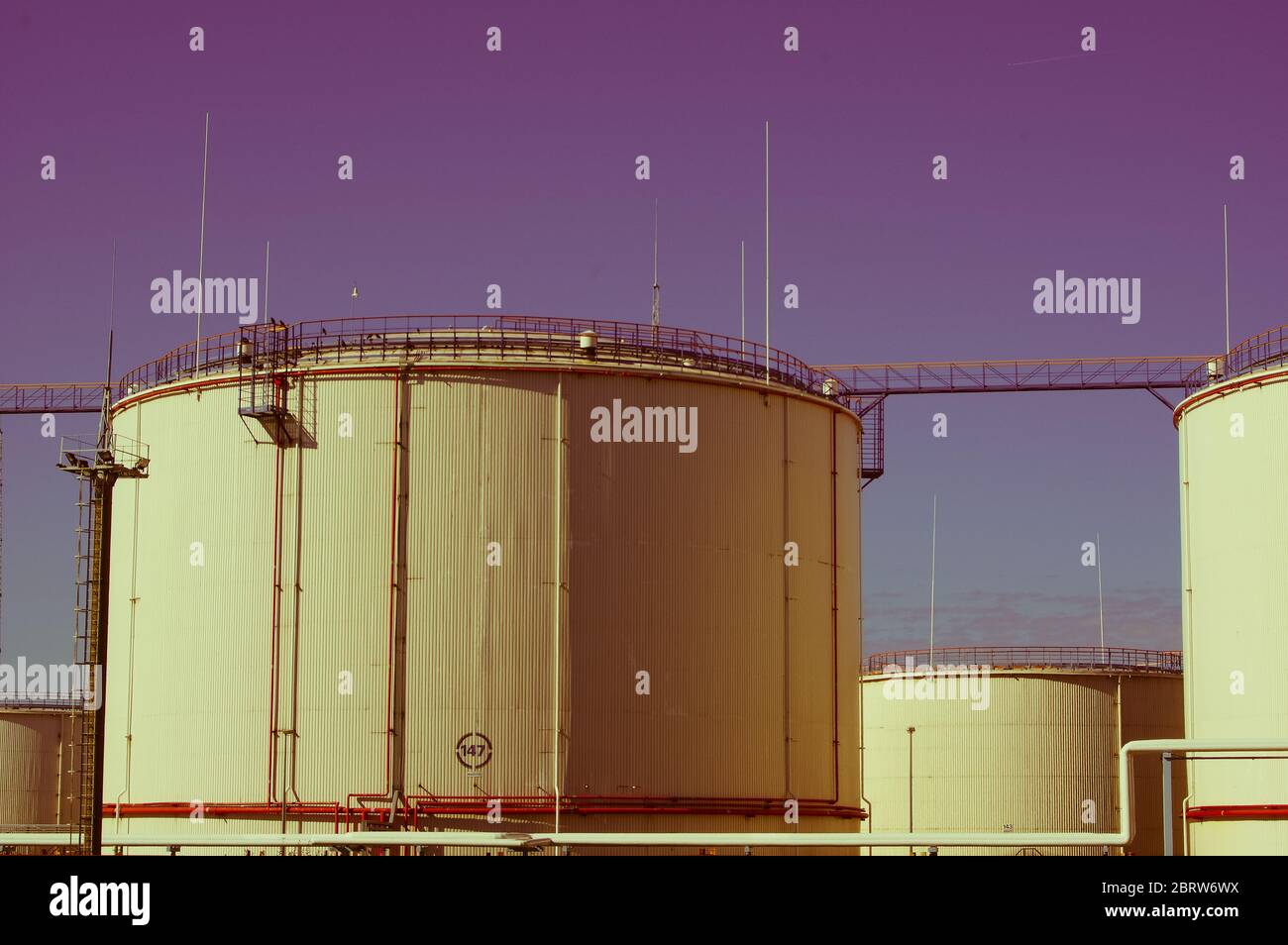 Crude oil tank in the oil refinery. Storage tanks for oil. Tanks for ...